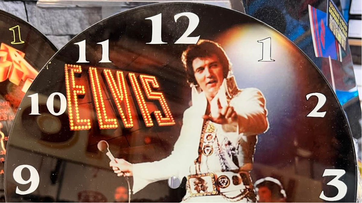 Enter Raffle to Win Elvis Glass Clock hosted by Laurence Griffin